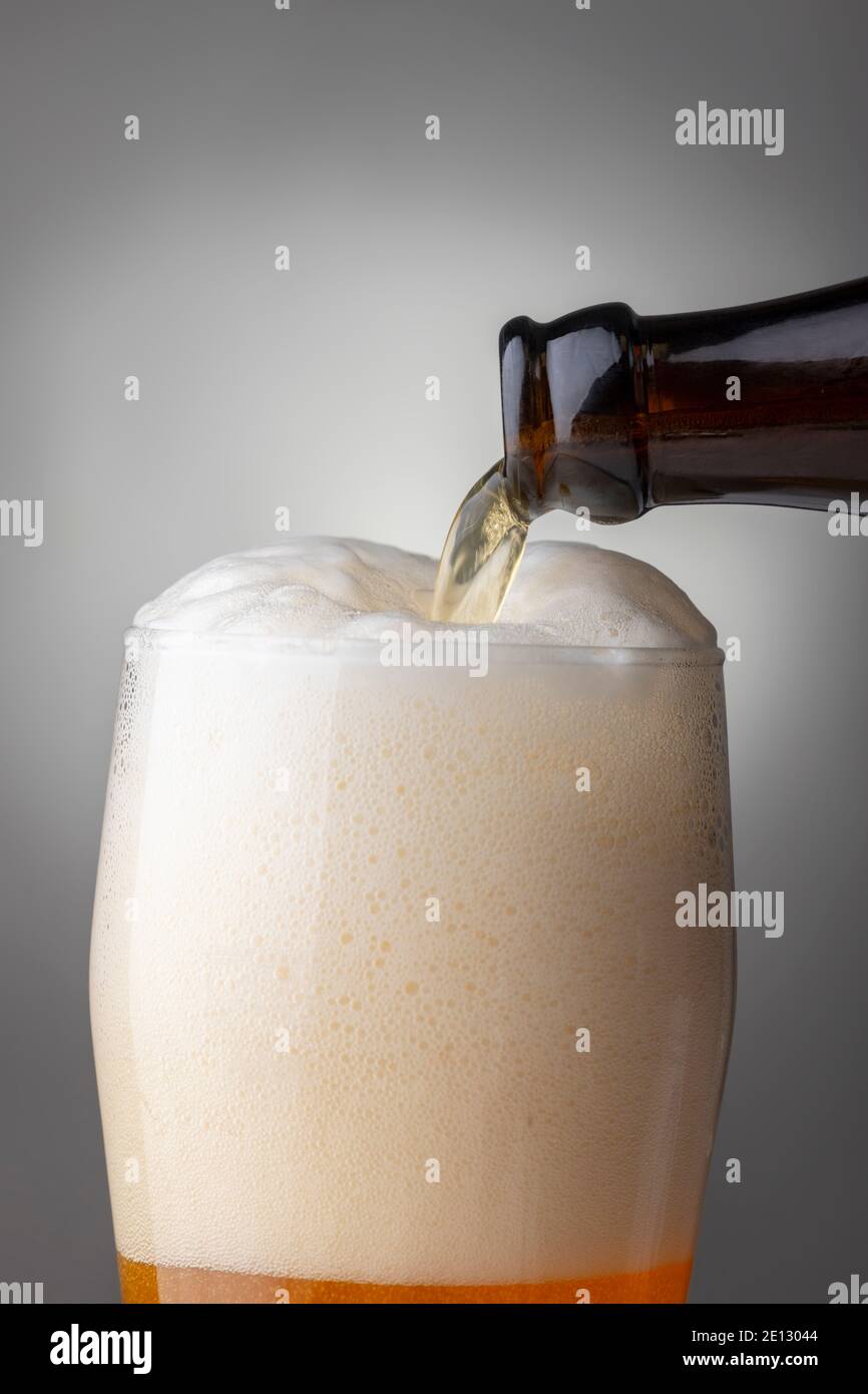 Bottle beer drops pouring close hi-res stock photography and images - Alamy