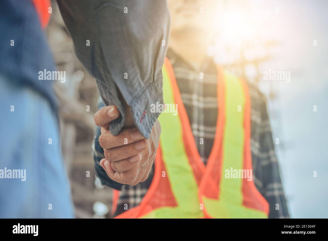 Business people shake hand on site building real estate project ,Hand ...