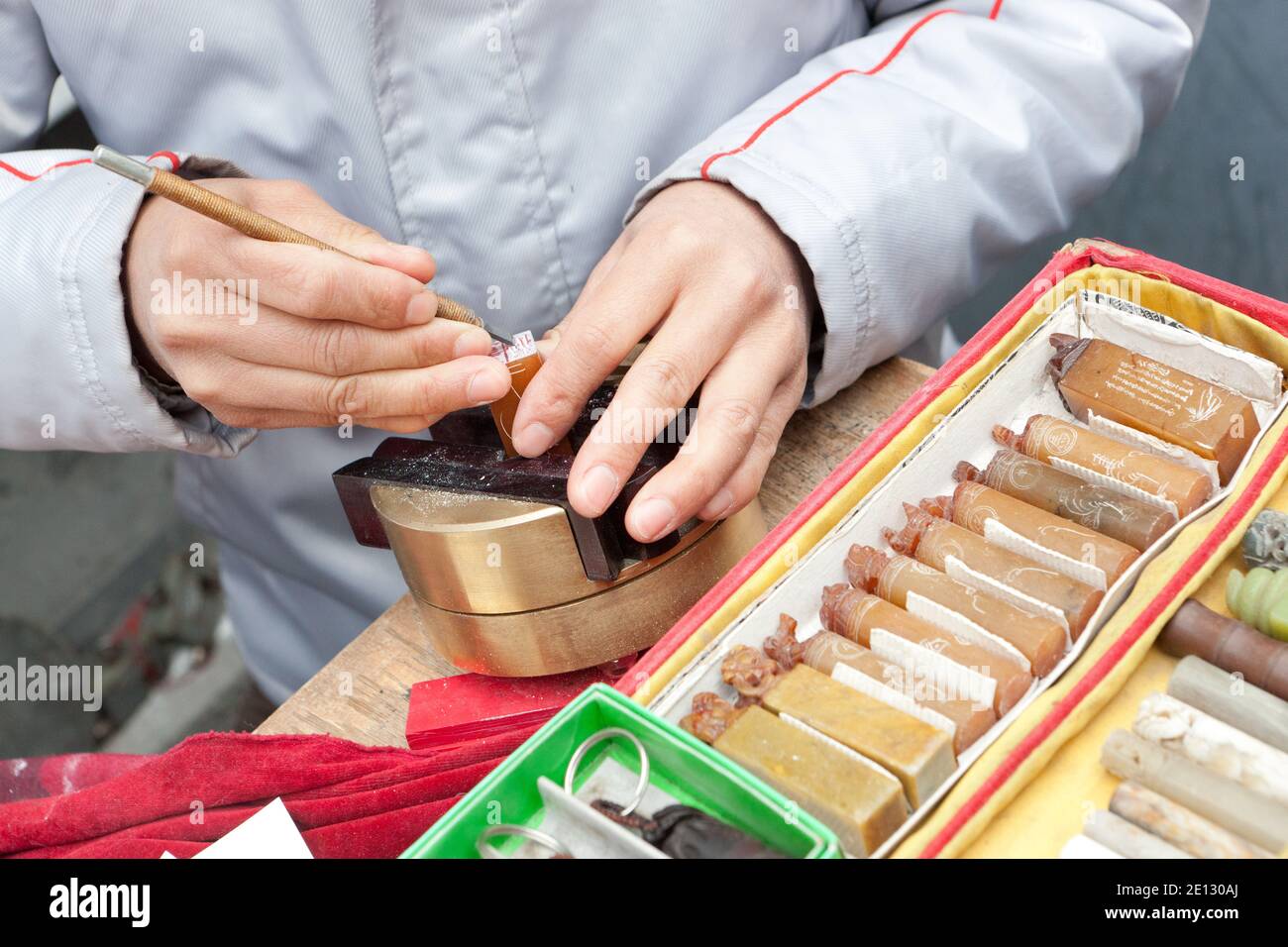 Beijing, China : Hands carving traditional stone name chops (name seals ...