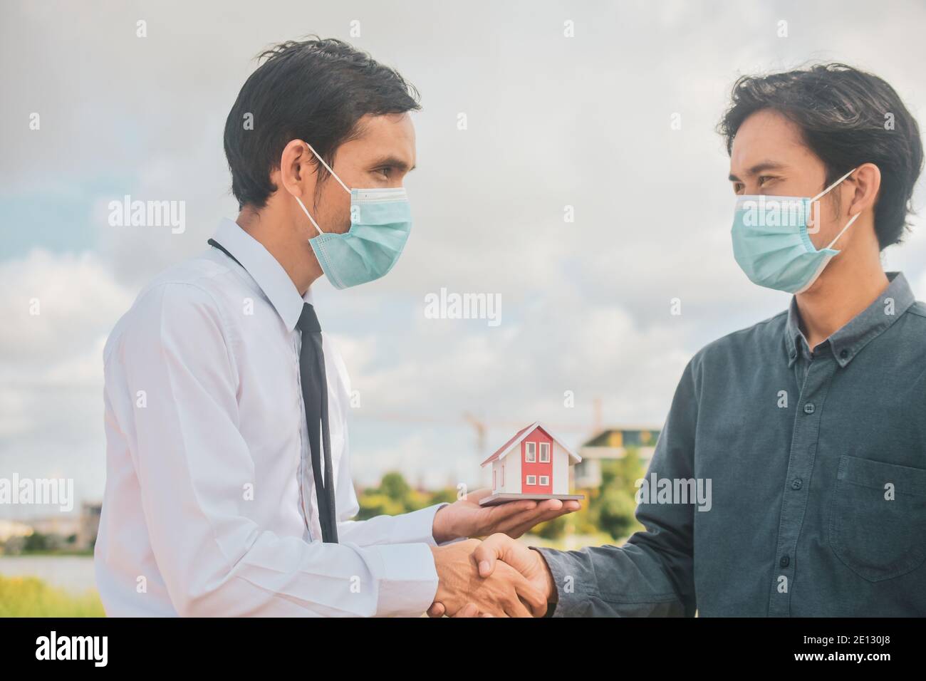 Businessman giving handshake customer hi-res stock photography and images - Alamy