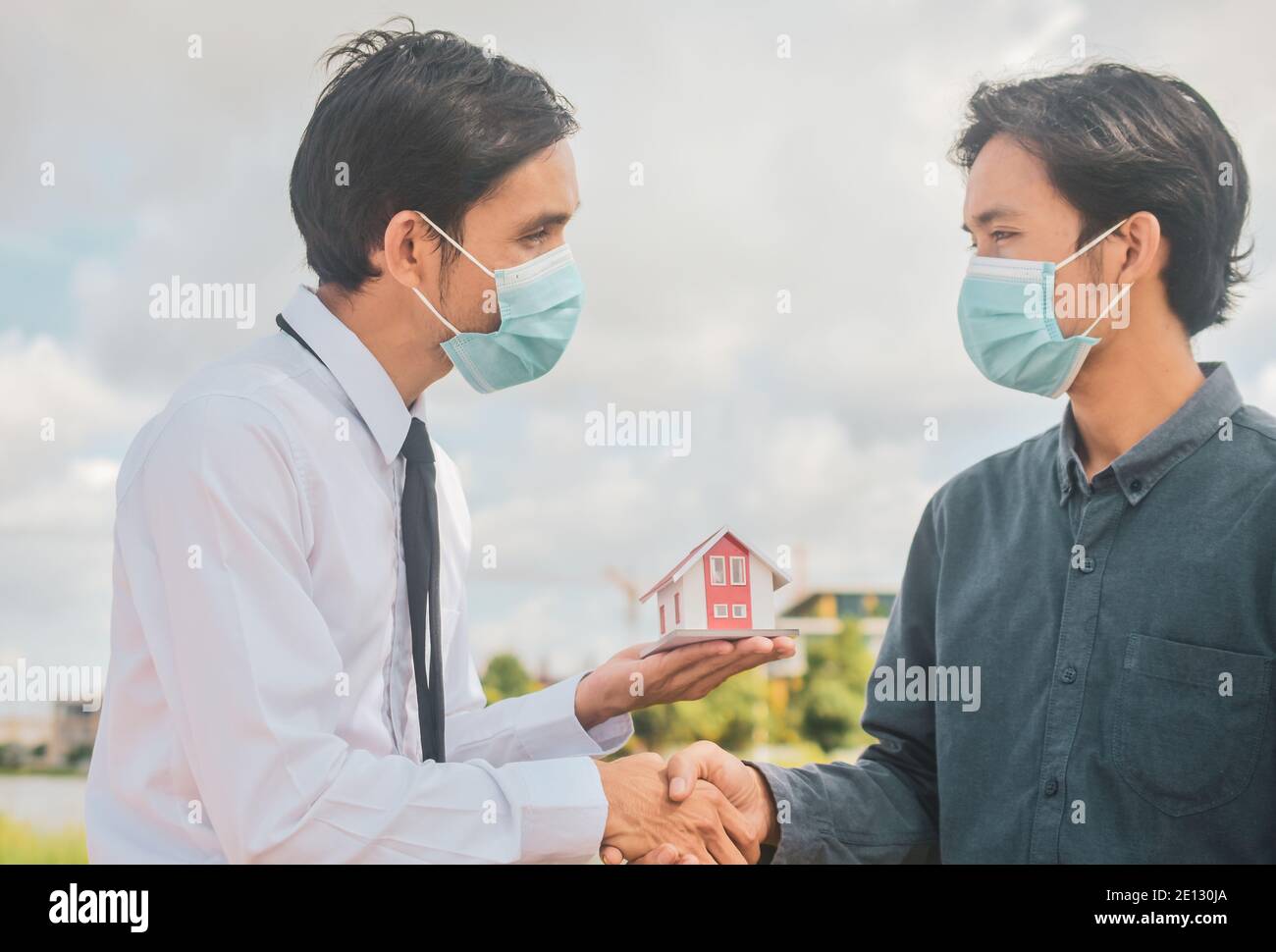 Businessman giving handshake customer hi-res stock photography and ...