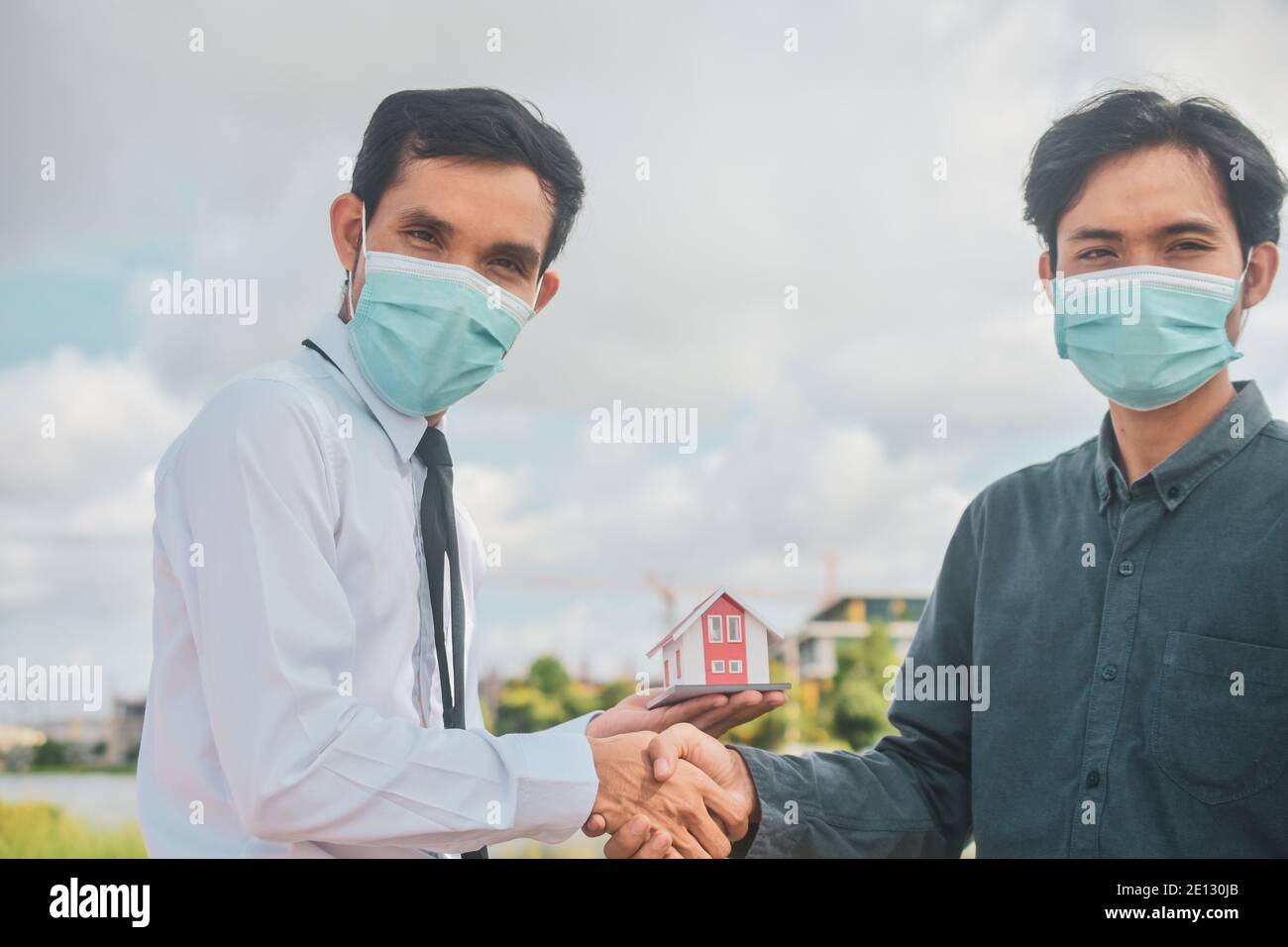 Businessman giving handshake customer hi-res stock photography and images - Alamy