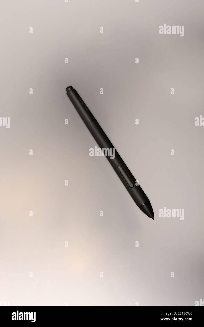 Stylus for digital tablet isolated on screen background. High ...