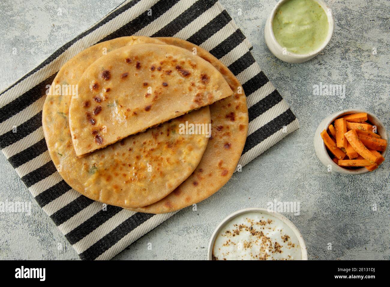 DELICIOUS STUFFED PARATHAS SERVED HOT Stock Photo - Alamy