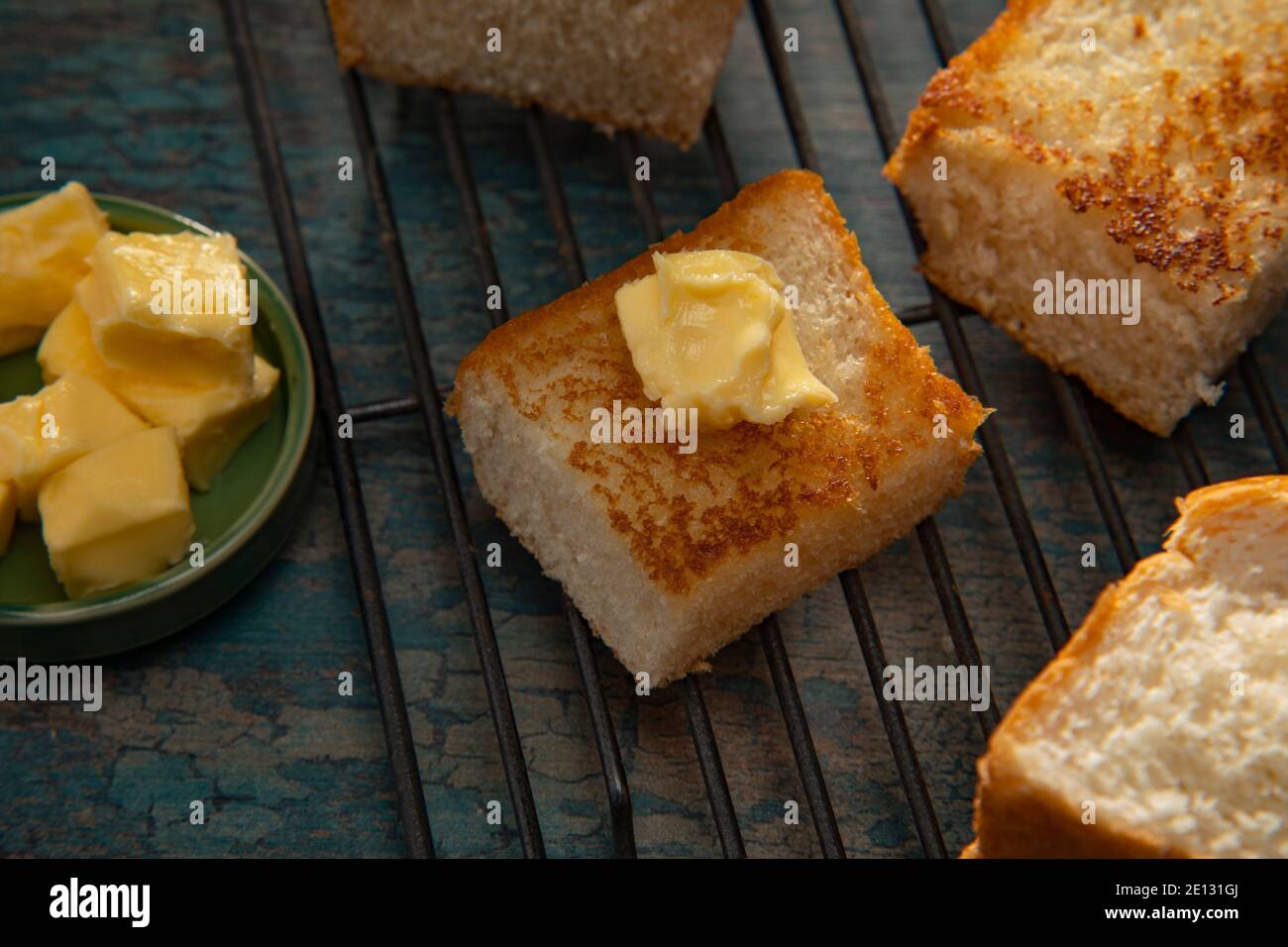 FRIED PAV WITH BUTTER ON TOP KEPT ON GRILLING TRAY Stock Photo - Alamy