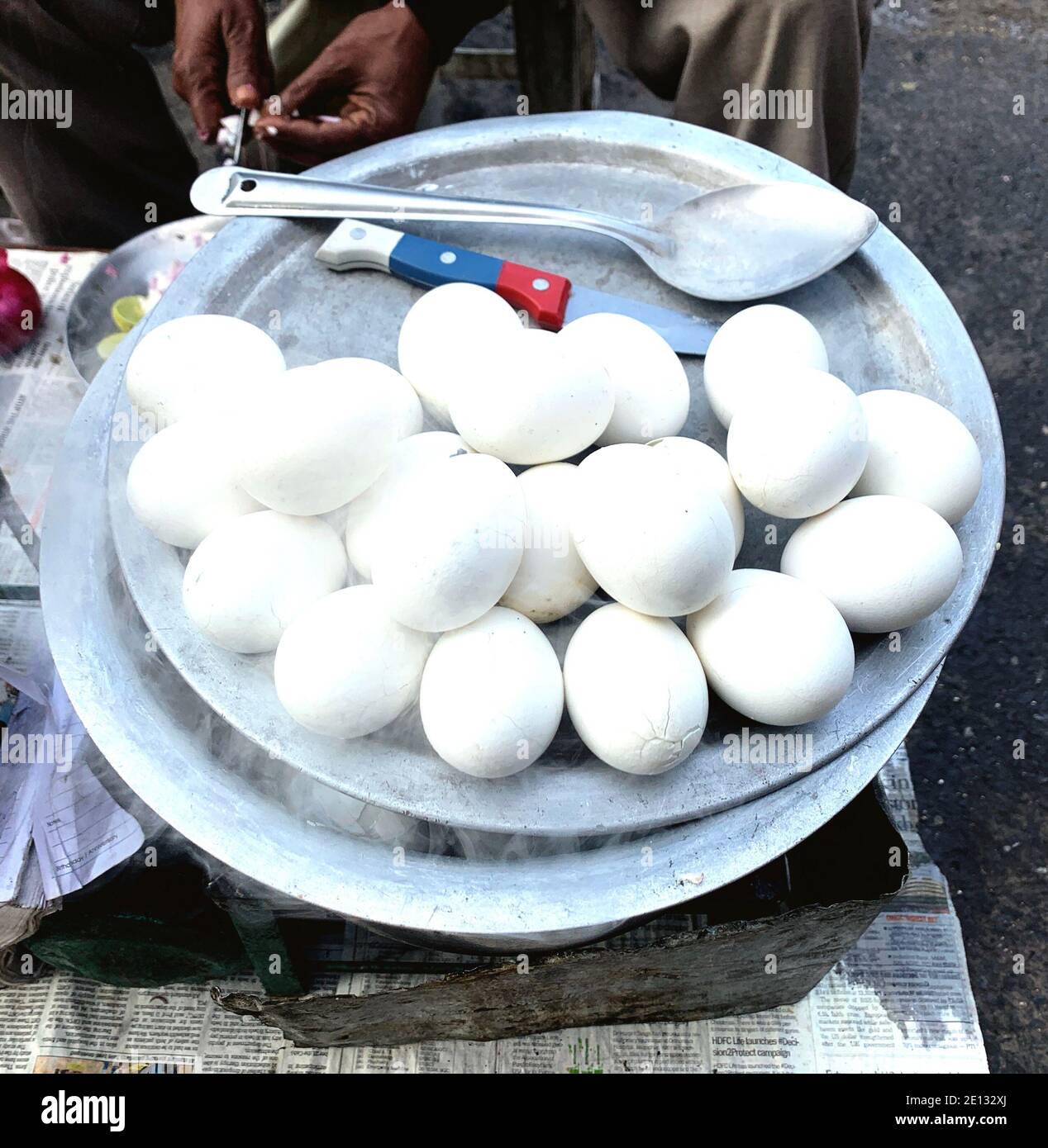 This picture shows boiled egges on street side Stock Photo - Alamy