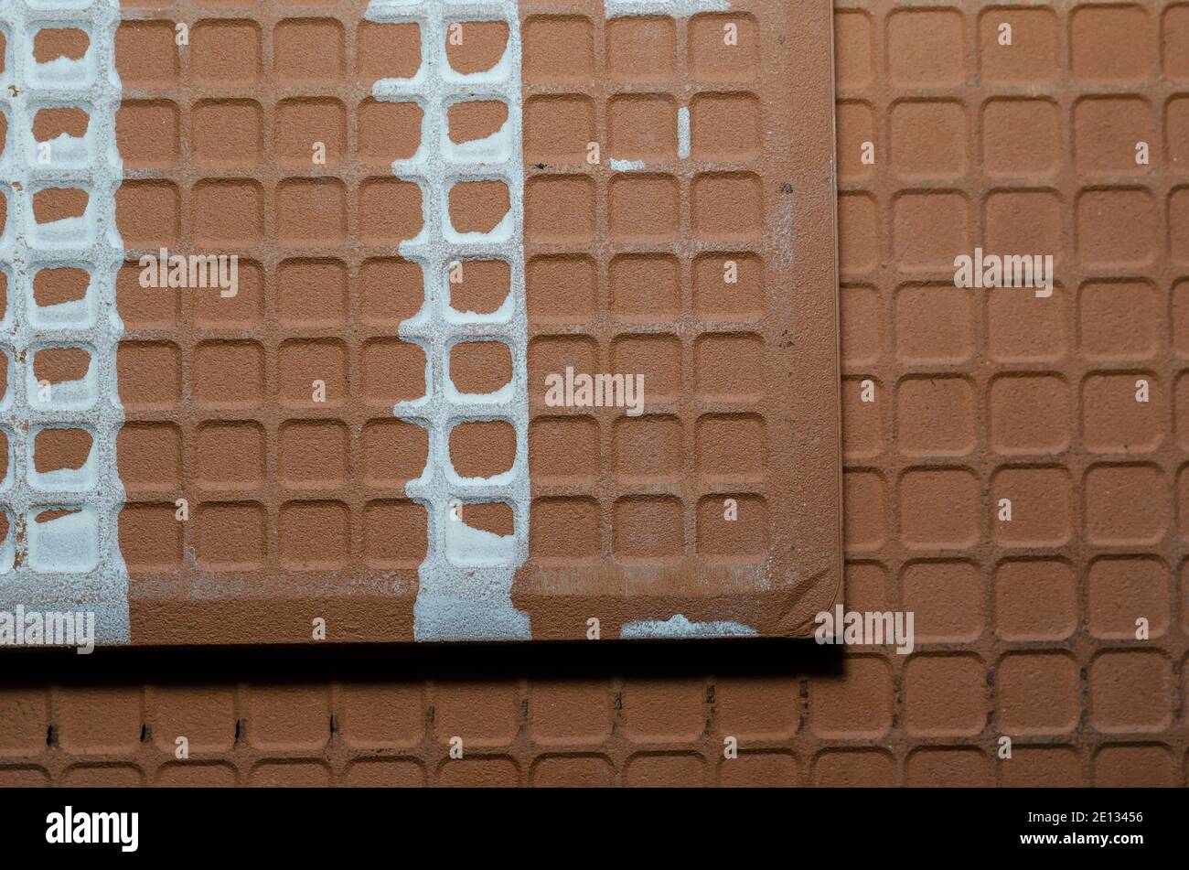 Backside of ceramic tiles with white engobe paste. It is a ceramic ...