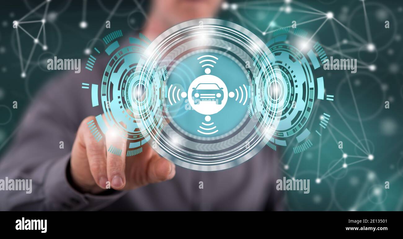 Man touching a smart car concept on a touch screen with his finger ...