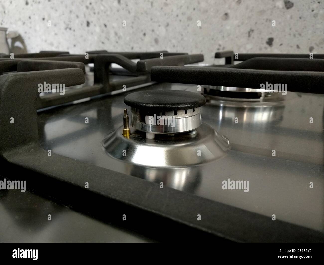 Modern kitchen stove on kitchen wall background Stock Photo - Alamy