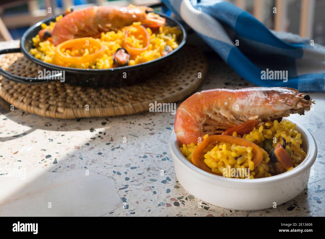 Paella typical spanish food in granite background Stock Photo - Alamy