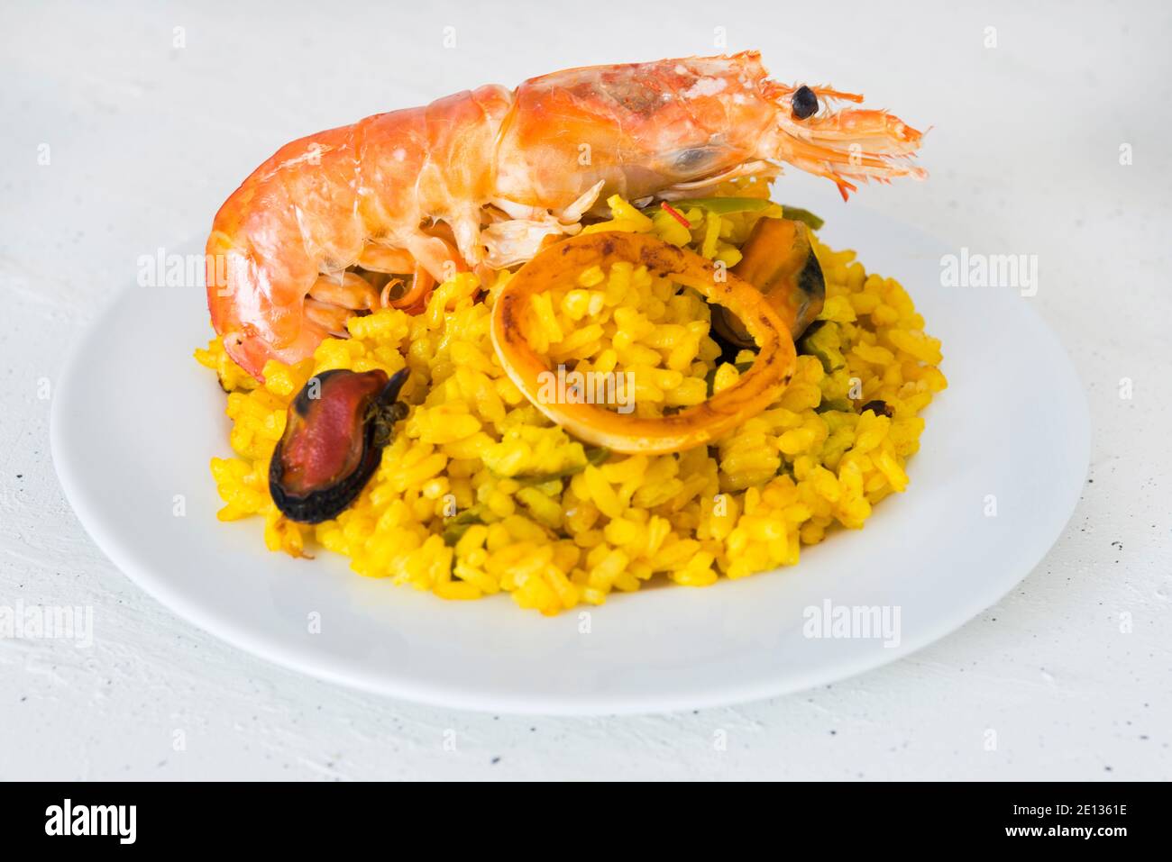 Paella typical spanish food in granite background Stock Photo - Alamy