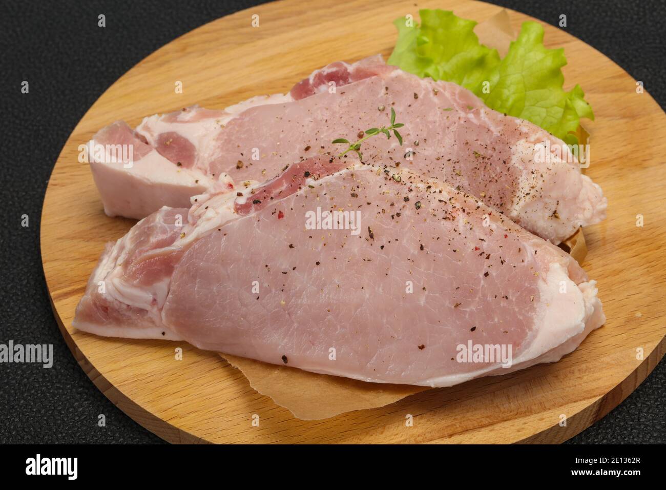 Raw pork meat steak ready for grill Stock Photo - Alamy
