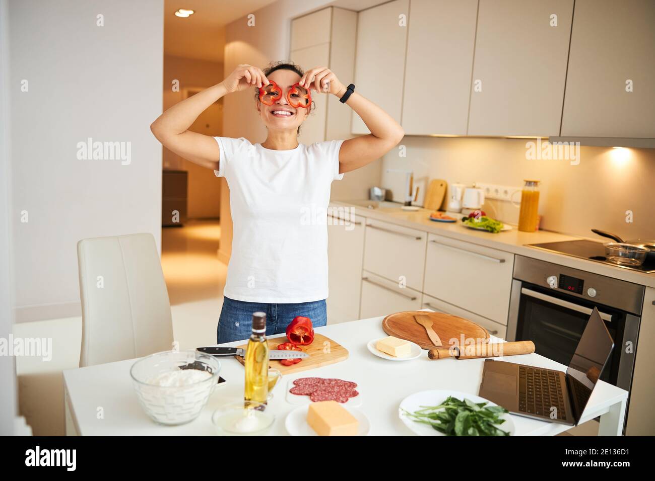 Feeling happy and having fun while cooking Stock Photo - Alamy