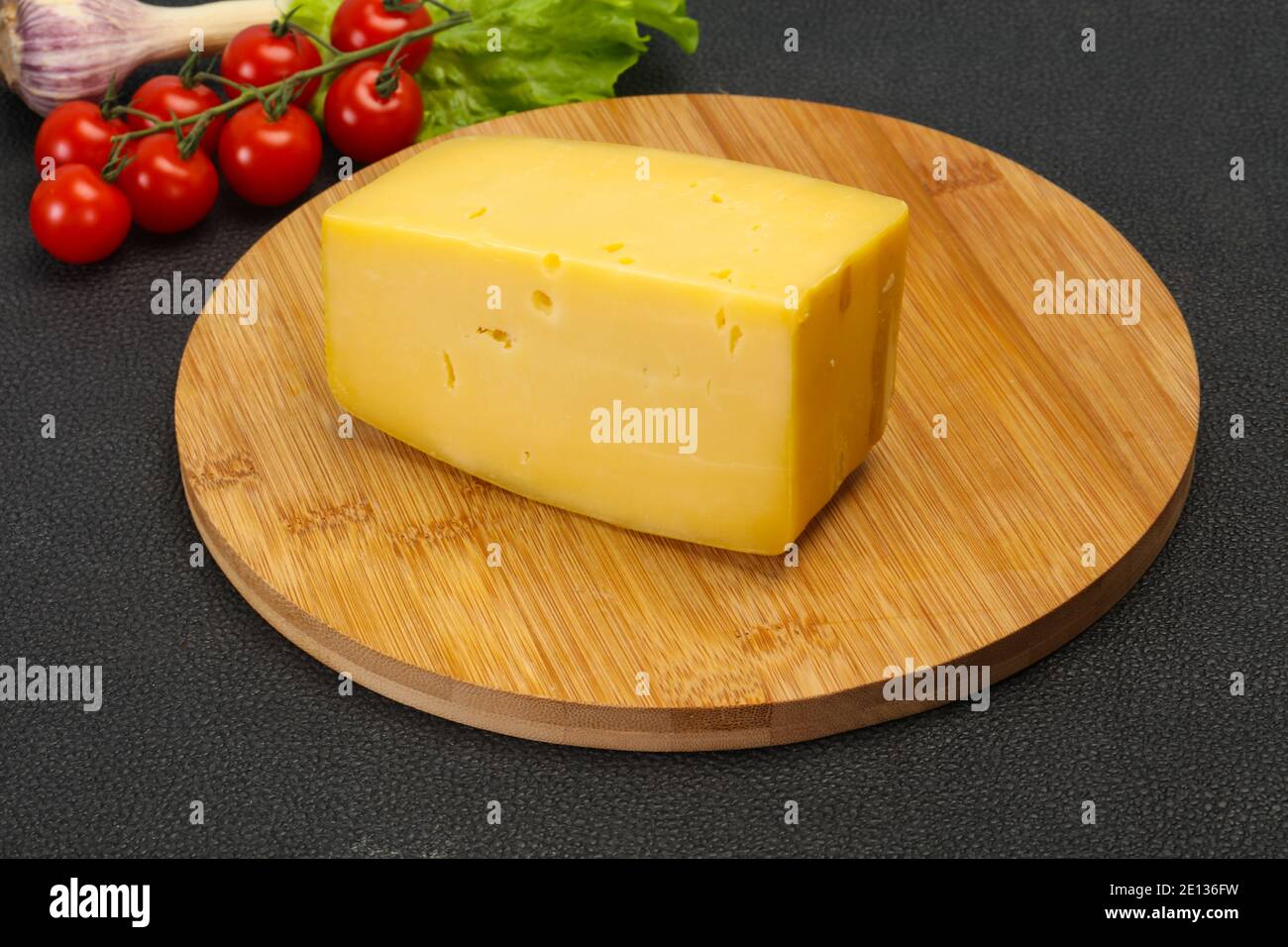 Swiss Hard yellow tasty cheese brick Stock Photo - Alamy