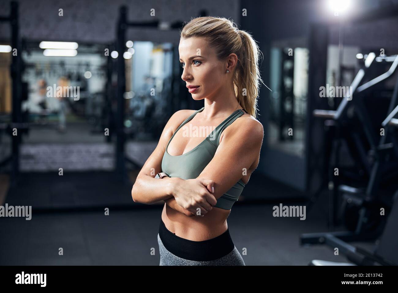 Woman hugging herself indoor hi-res stock photography and images - Alamy
