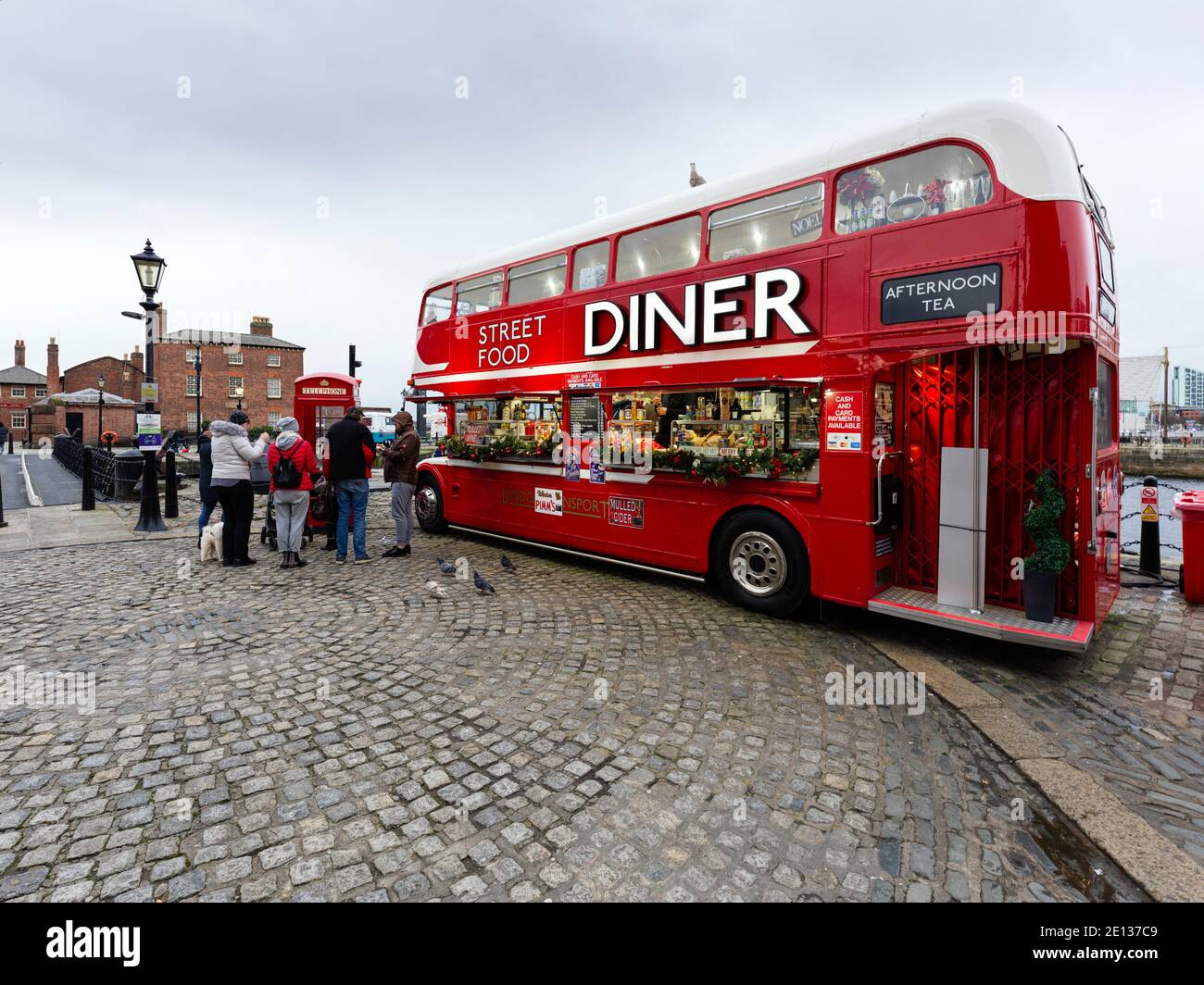 London double decker bus used as a street food diner in Albert Dock ...