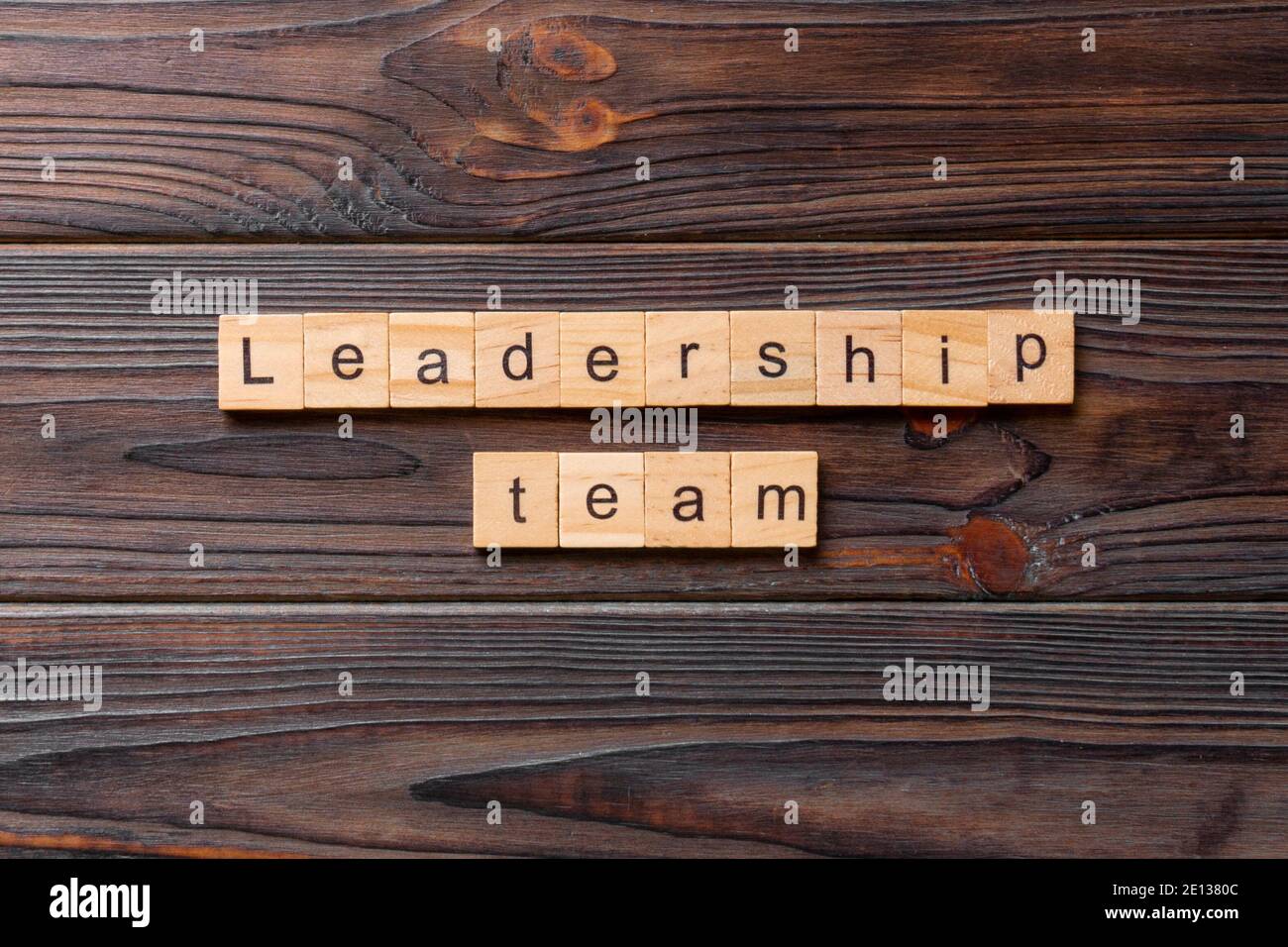 leadership team word written on wood block. leadership team text on ...