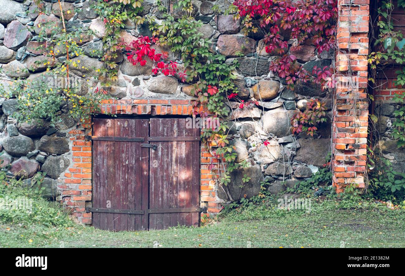 Wooden gate with a lock in an old house Stock Photo - Alamy