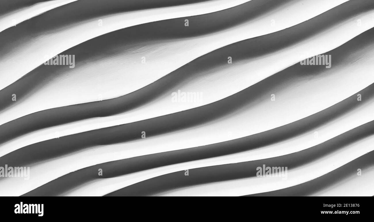 abstract striped of stone texture, curve sculpture. Close-up of black ...