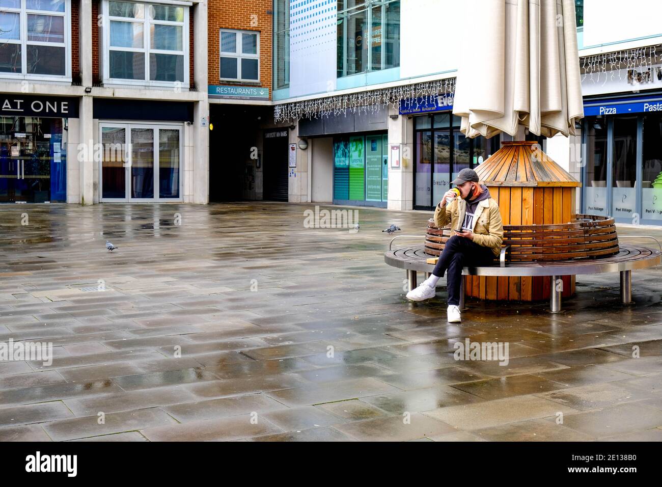 Epsom, London UK, January 03 2021, Lone Young Man Sitting Alone In An ...