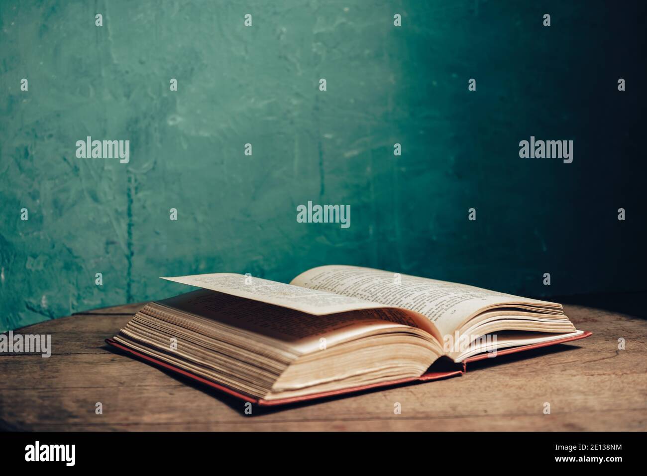 Open vintage ancient book. Pattern background for design. The book on a ...