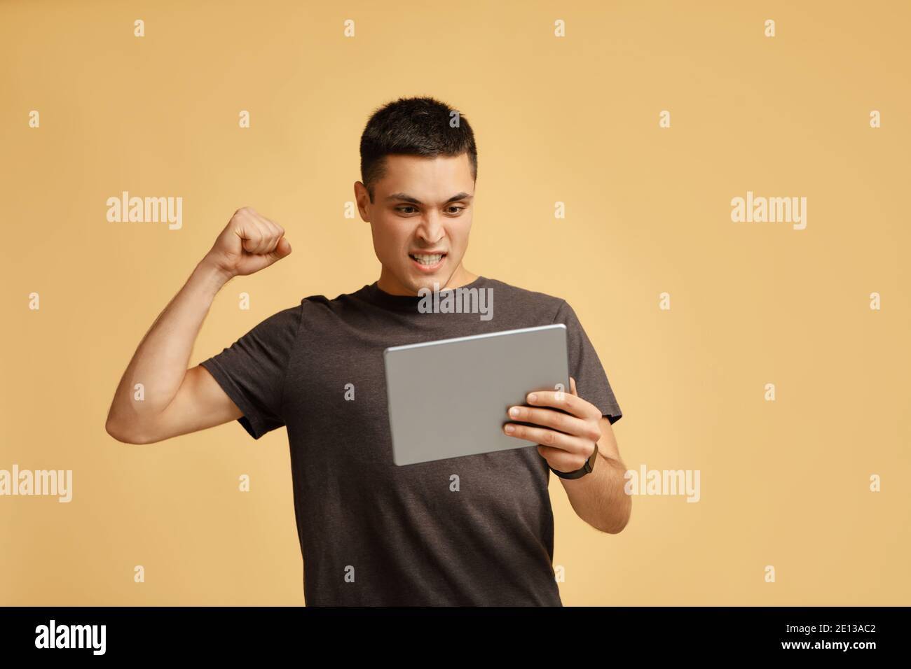 Victory online, gesture of luck and success in game Stock Photo - Alamy