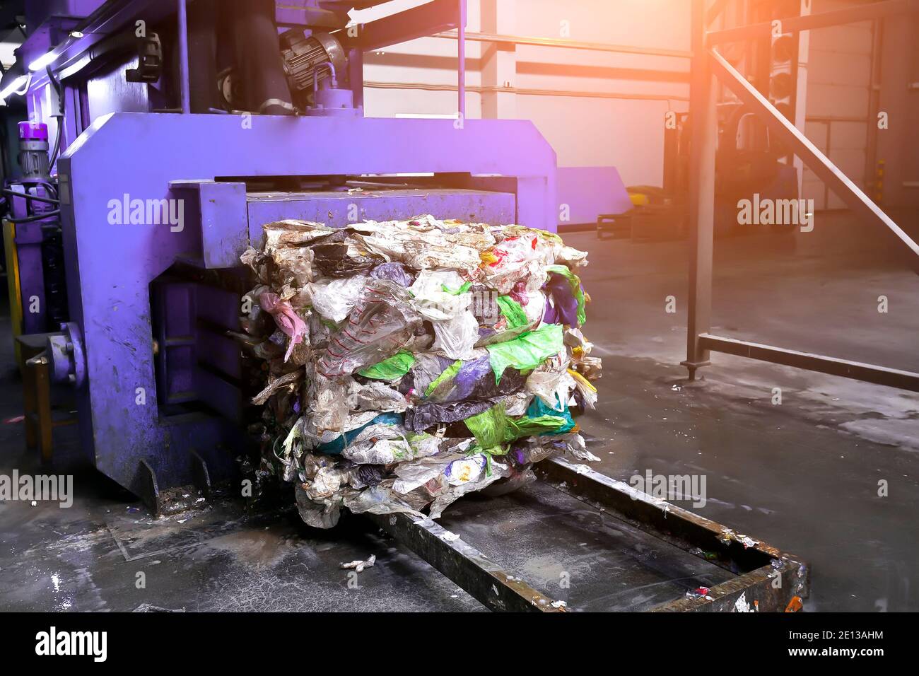 Garbage press. Sorting of garbage Stock Photo - Alamy