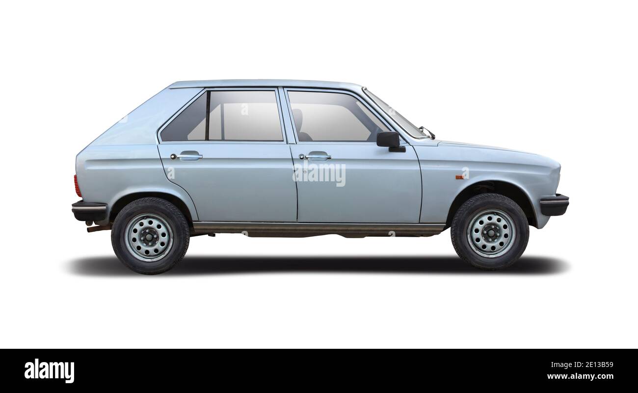 Classic French hatchback car side view isolated on white background ...