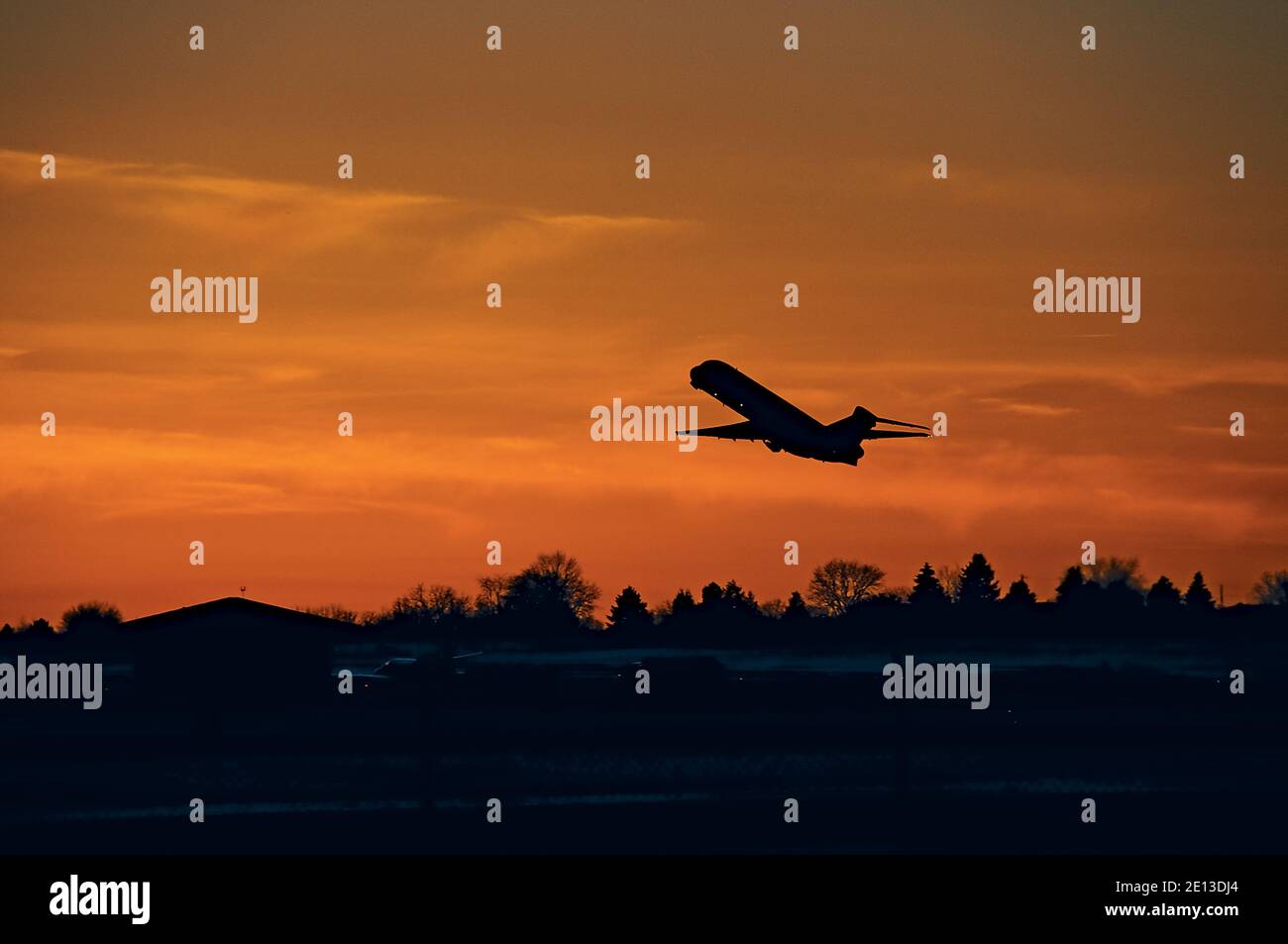Jet Aircraft Taking off at Sunset Stock Photo - Alamy