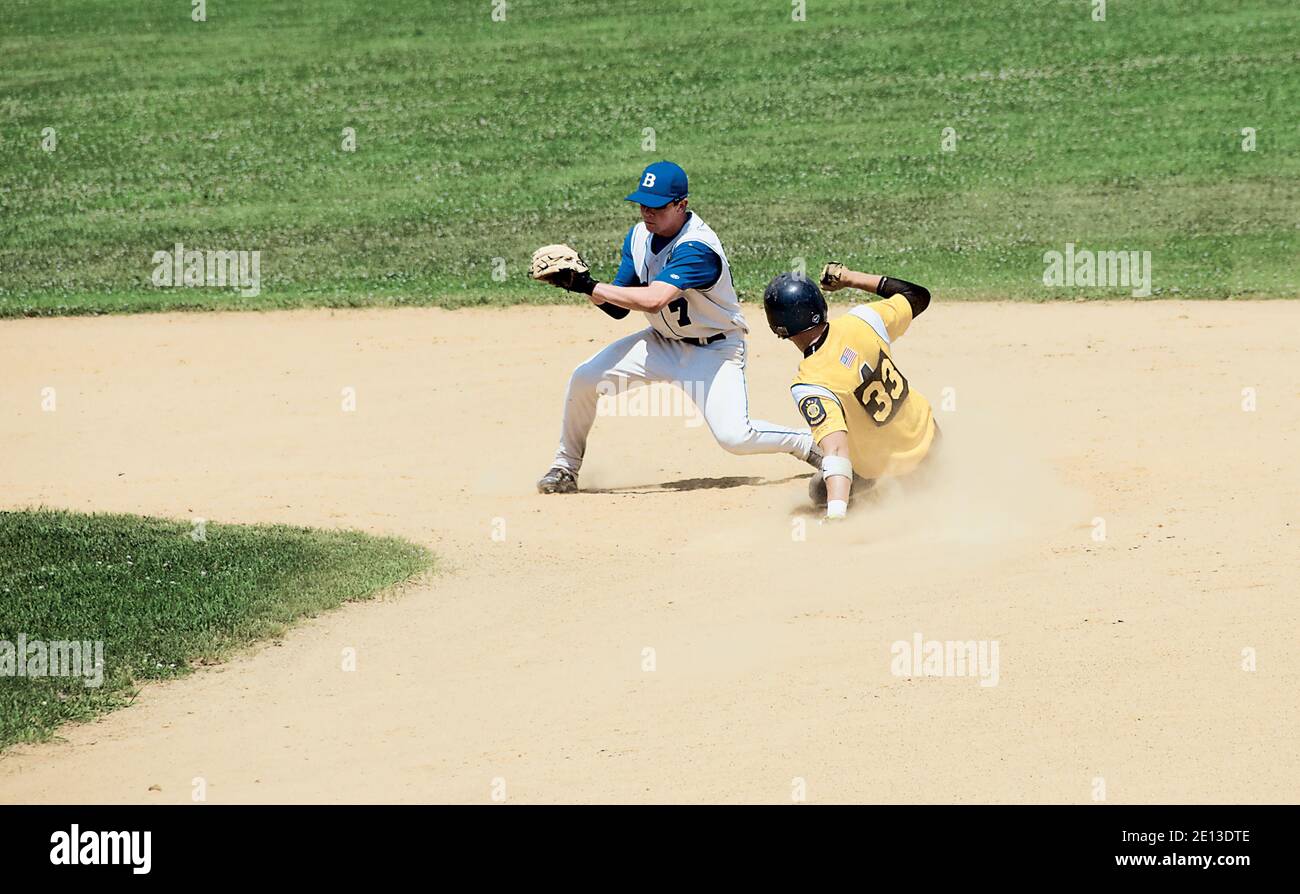 Sliding into Second Base Baseball Game Stock Photo - Alamy