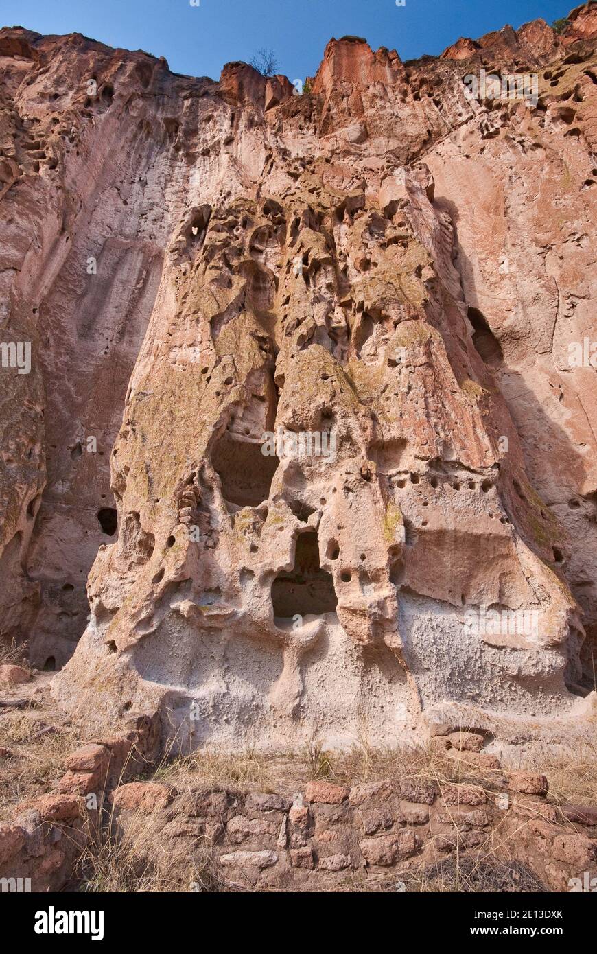 Long House cavates (cliff dwellings) carved in volcanic tuff rocks by ...