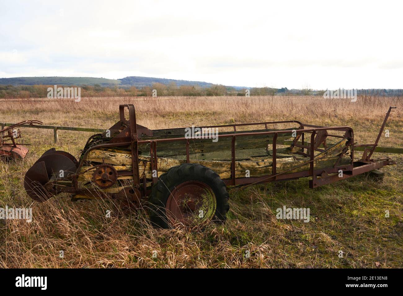 Old farming machinery in field, 1950s Muck spreader Stock Photo - Alamy