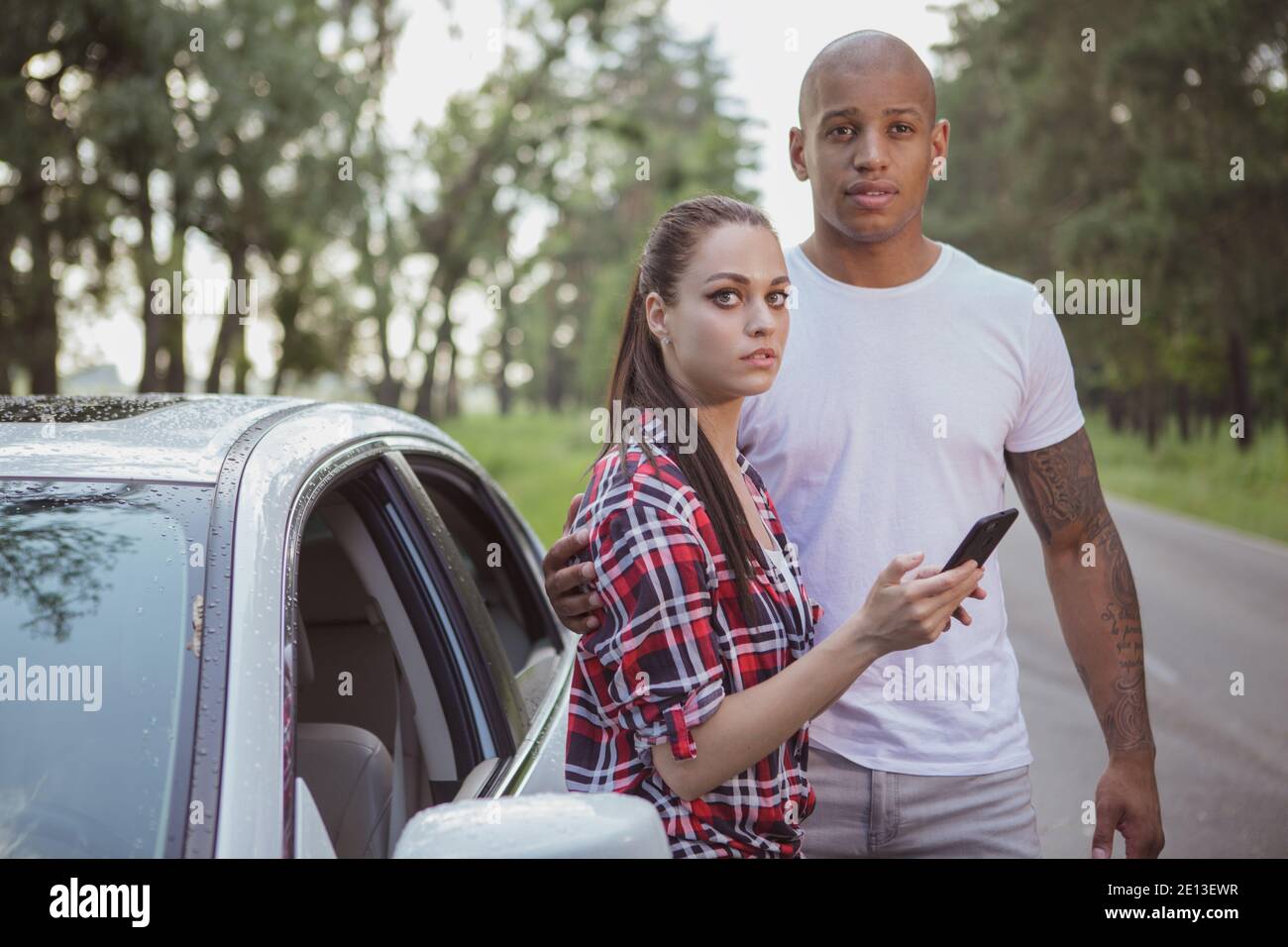 Woman calling roadside service hi-res stock photography and images - Alamy