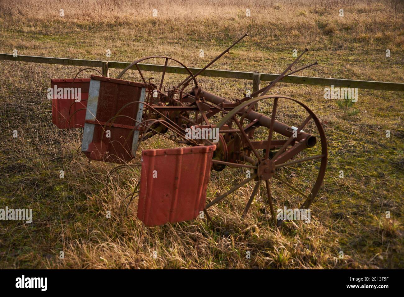 Old farming machinery in field Stock Photo - Alamy