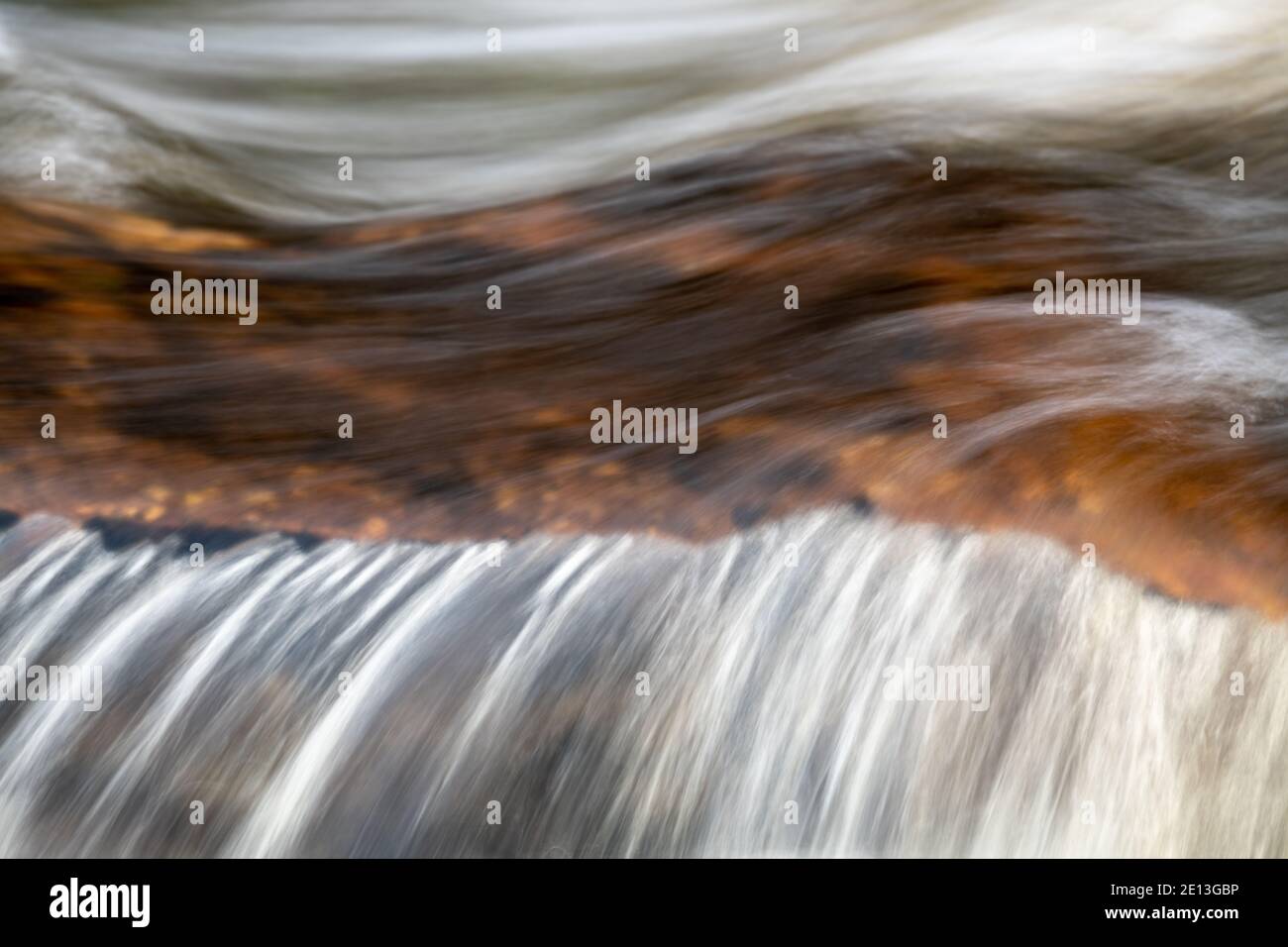 Water flowing over rocks in the Corrieshalloch Gorge, Ullapool ...