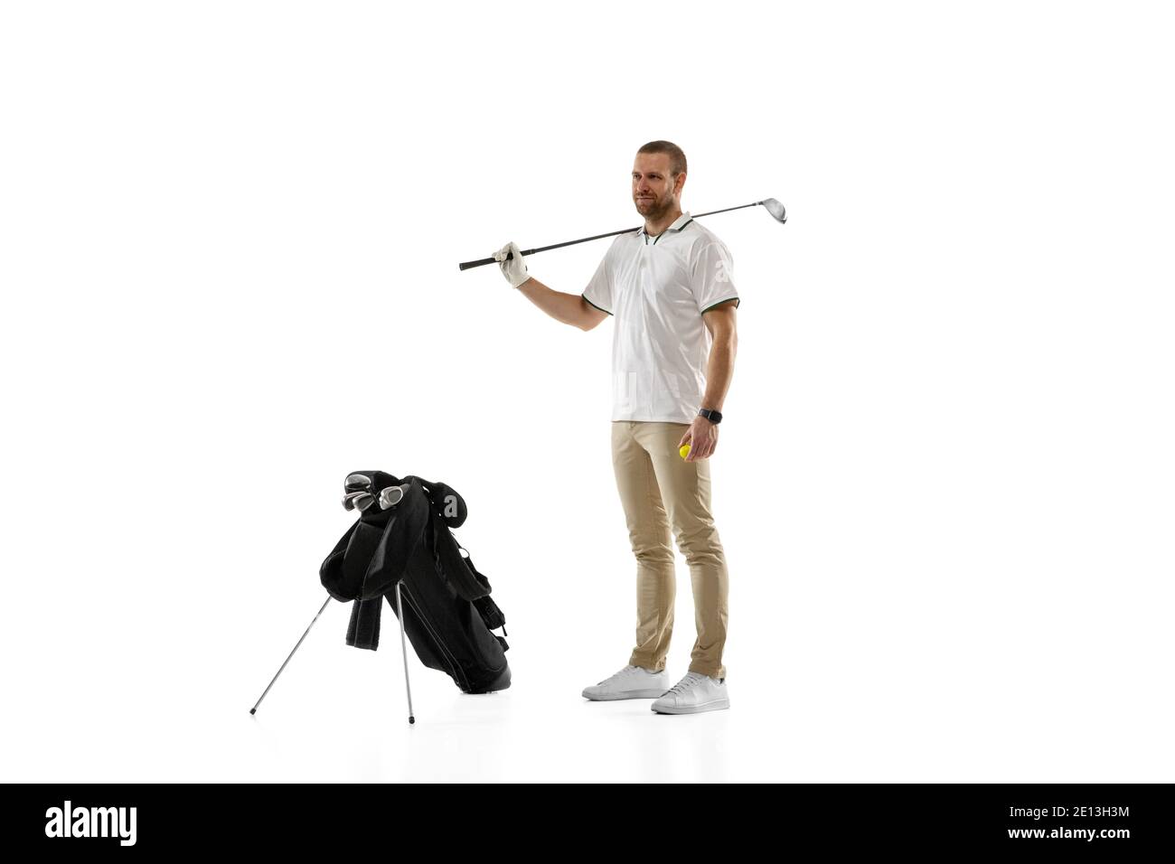 Winner. Golf player in a white shirt practicing, playing isolated on ...