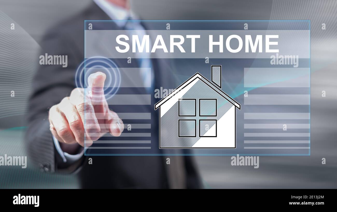 Man touching a smart home concept on a touch screen with his fingers ...