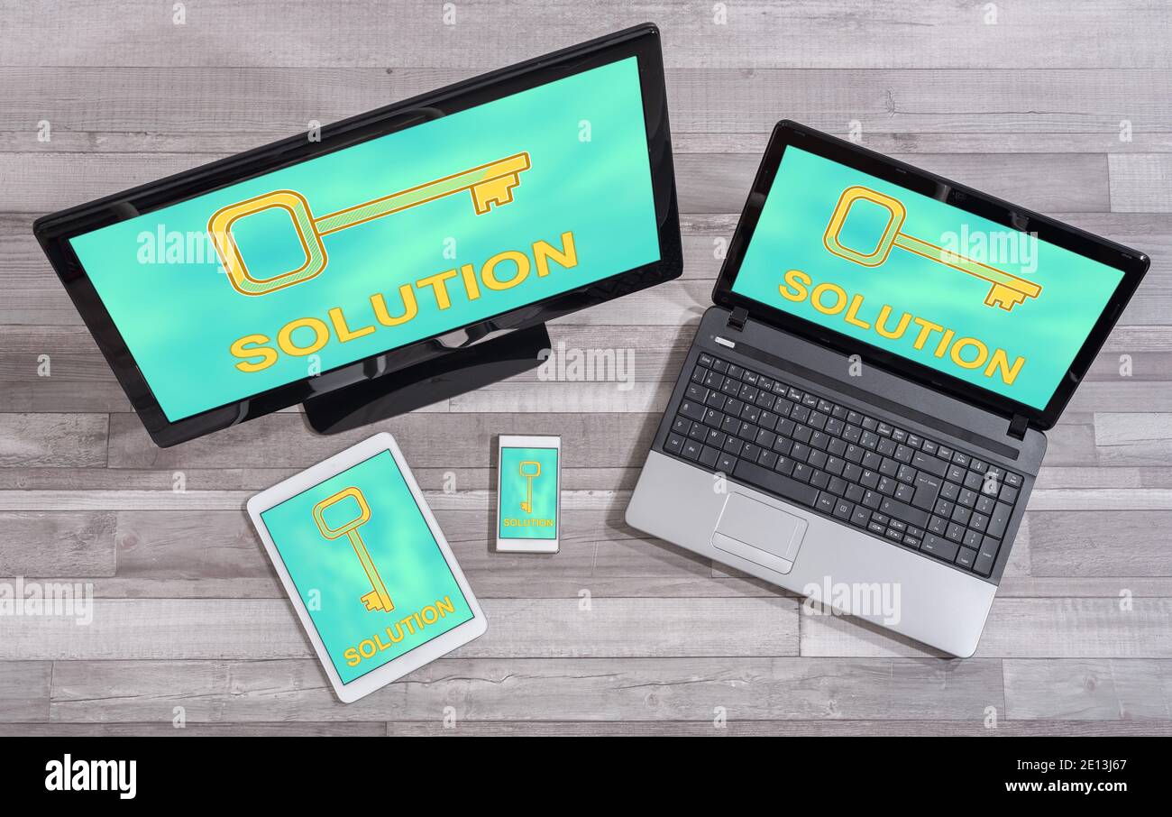Solution concept shown on different information technology devices ...