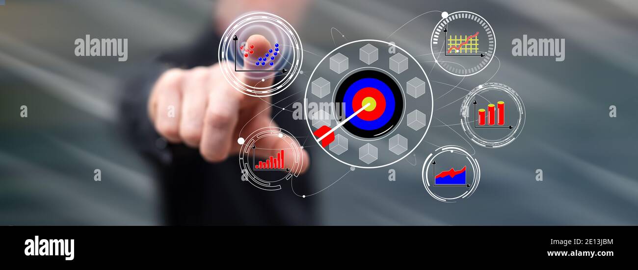 Man touching a target marketing concept on a touch screen with his ...
