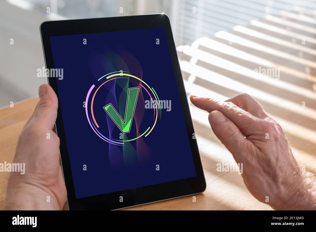 Tablet screen displaying a validation concept Stock Photo - Alamy