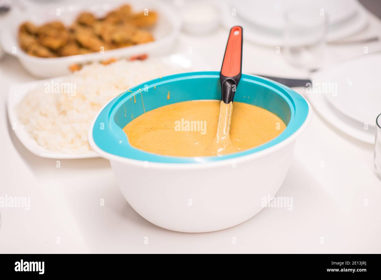 Beautiful ready lunch on dining table in modern home Stock Photo - Alamy