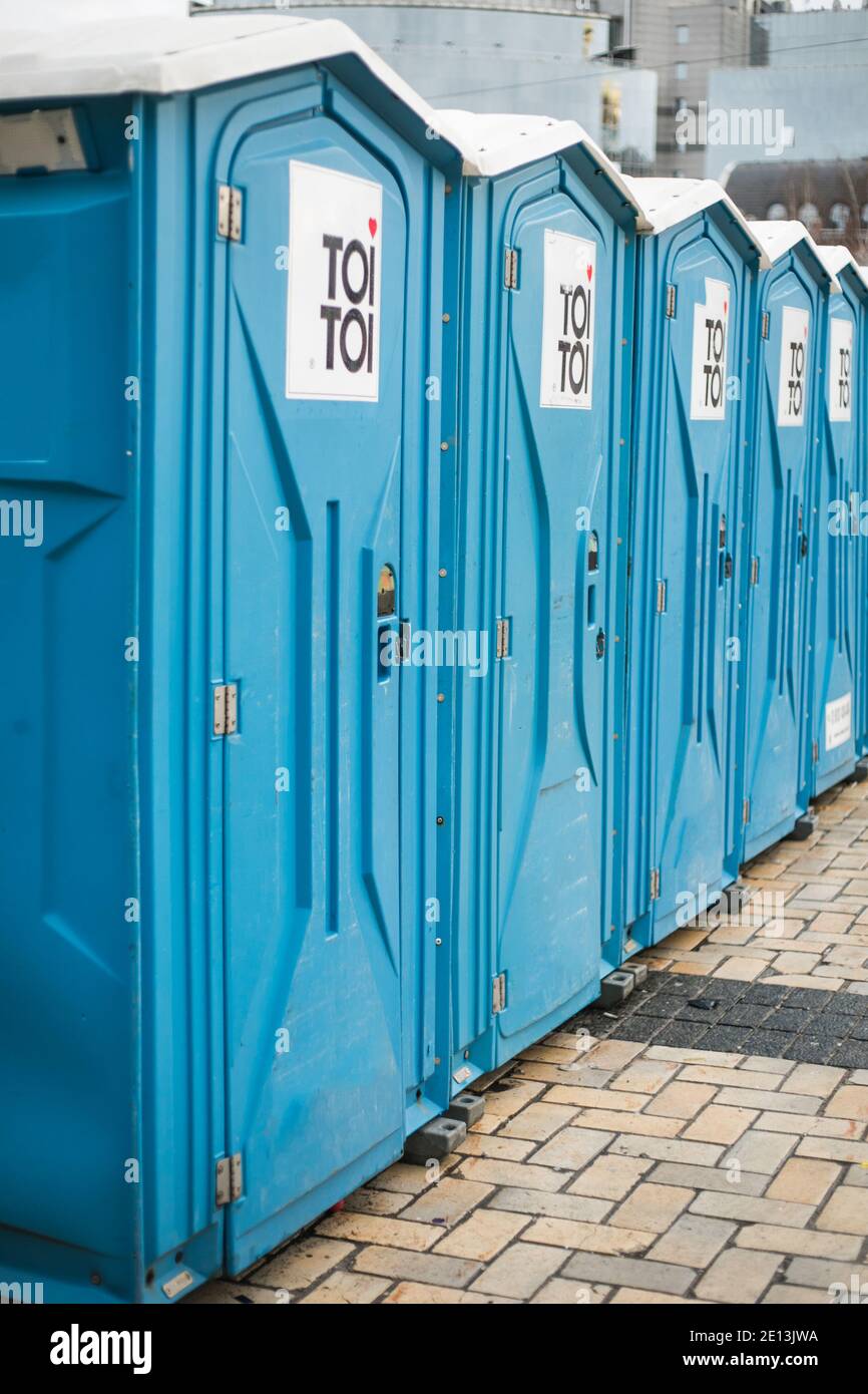 many portable toilet cubicles installed in a public city Stock Photo ...