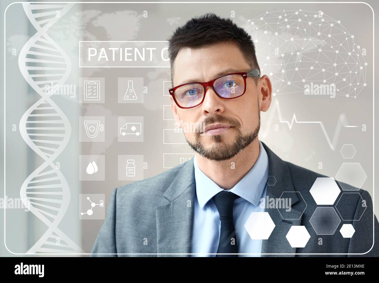 Man with electronic patient record on grey background. Innovative ...