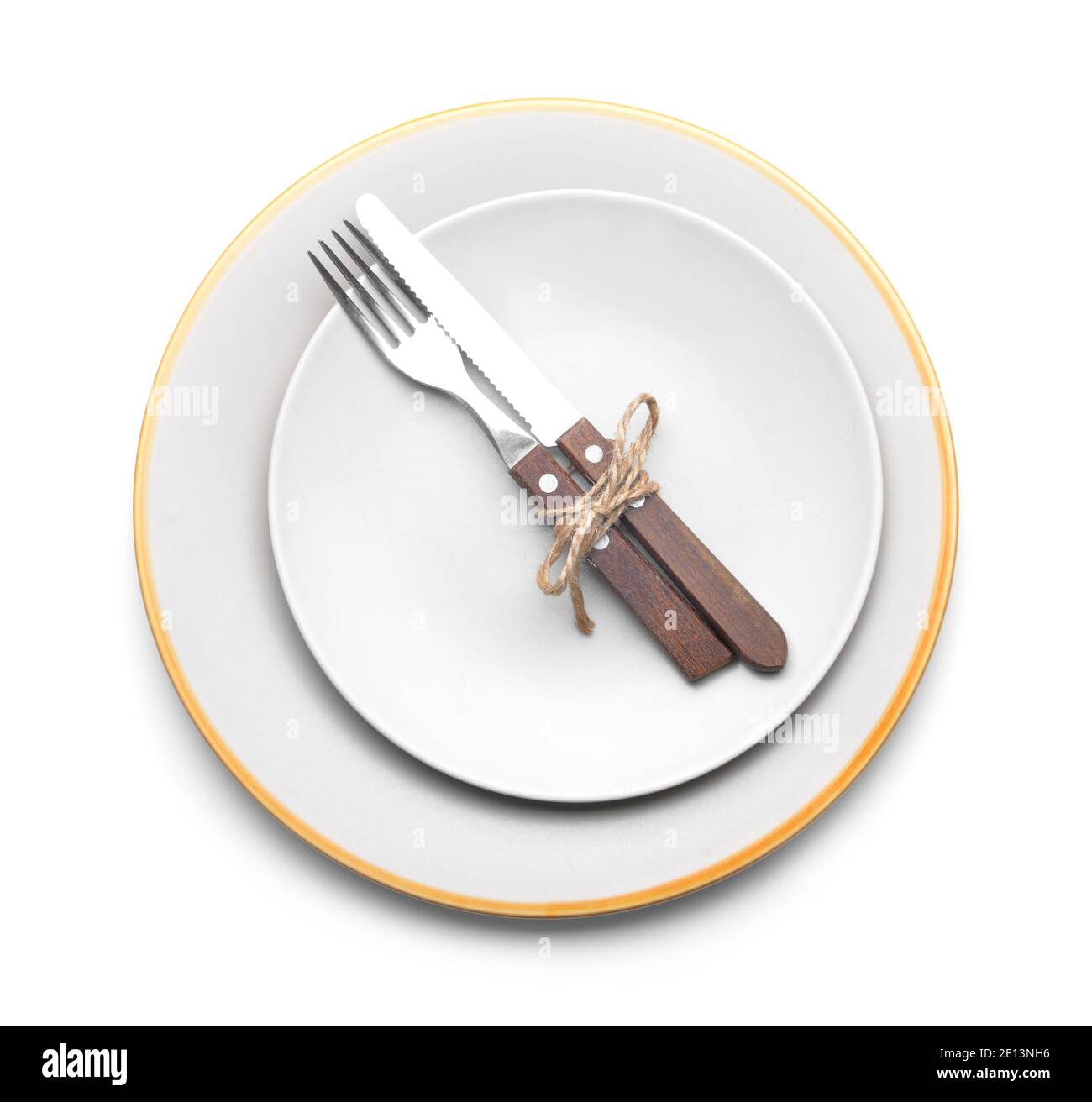 Beautiful table setting on white background Stock Photo - Alamy