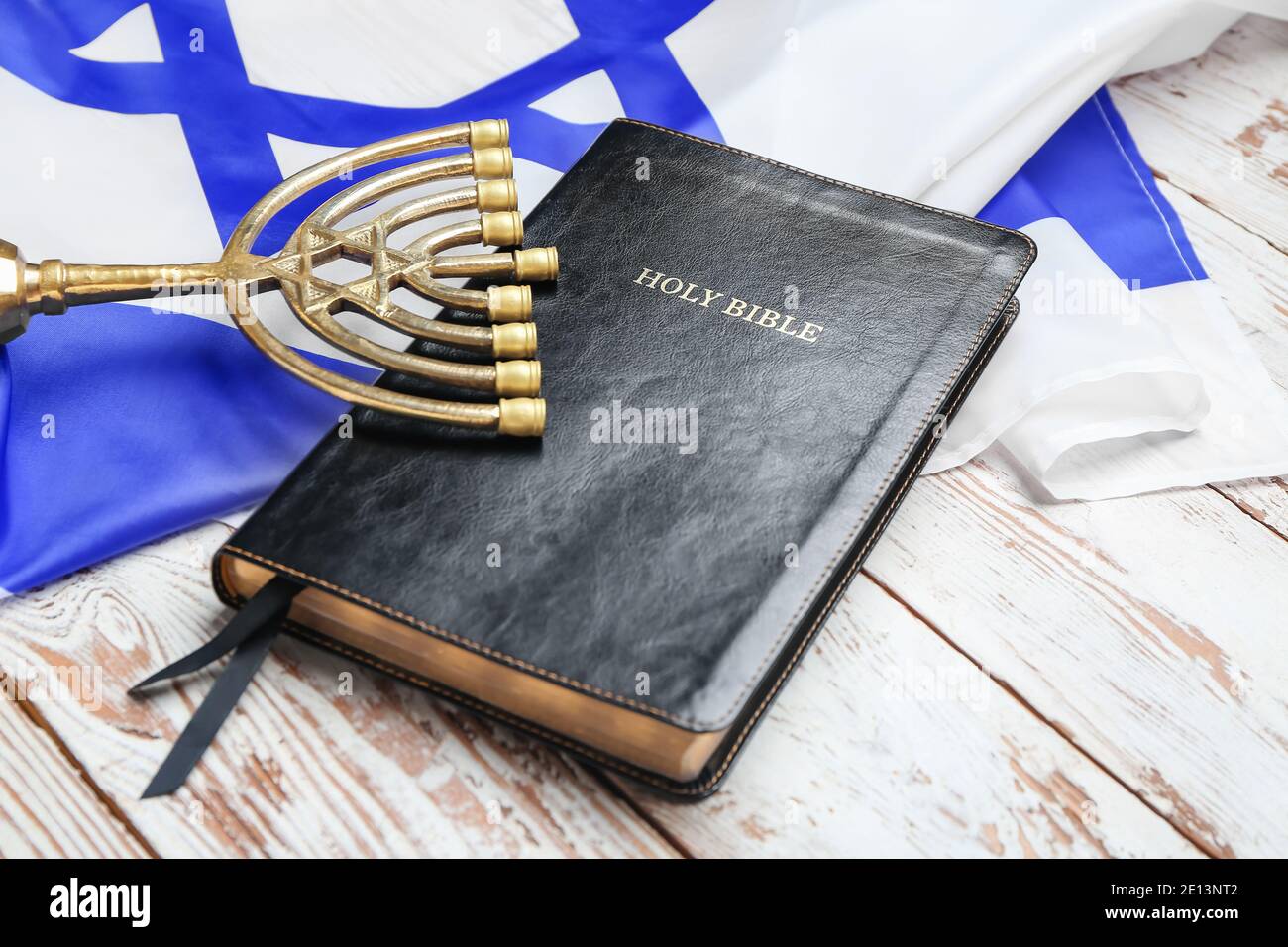 Flag of Israel, Holy Bible and menorah on wooden background Stock Photo ...