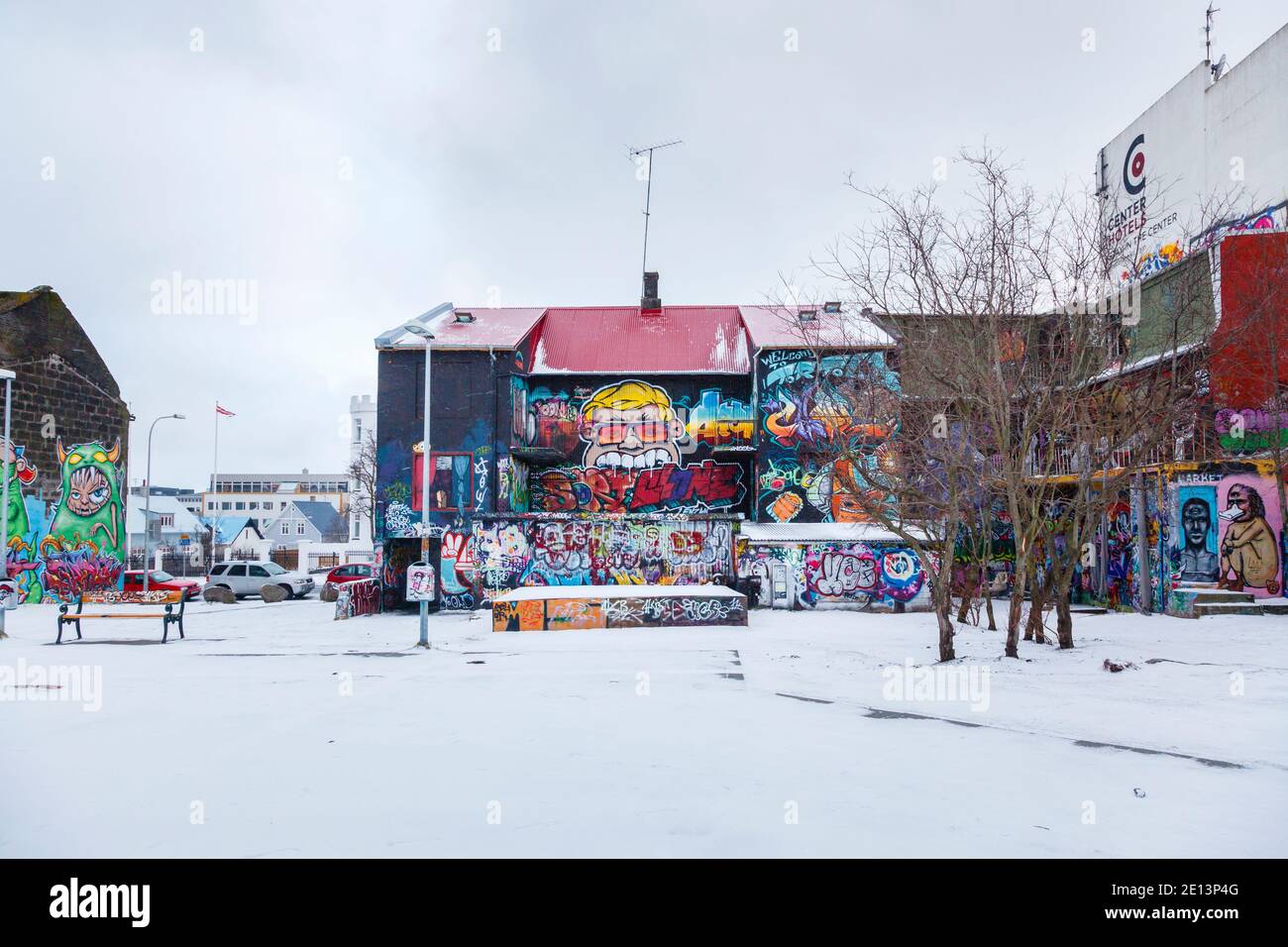 Colourful graffiti spray painted on walls in a run-down area of ...