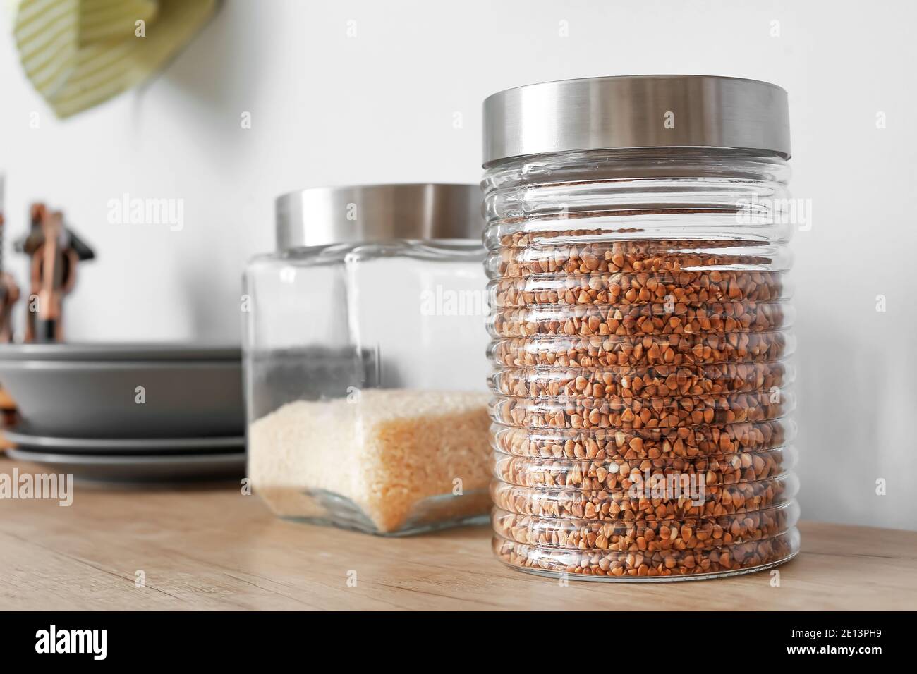 Glass jars with products on kitchen counter Stock Photo - Alamy