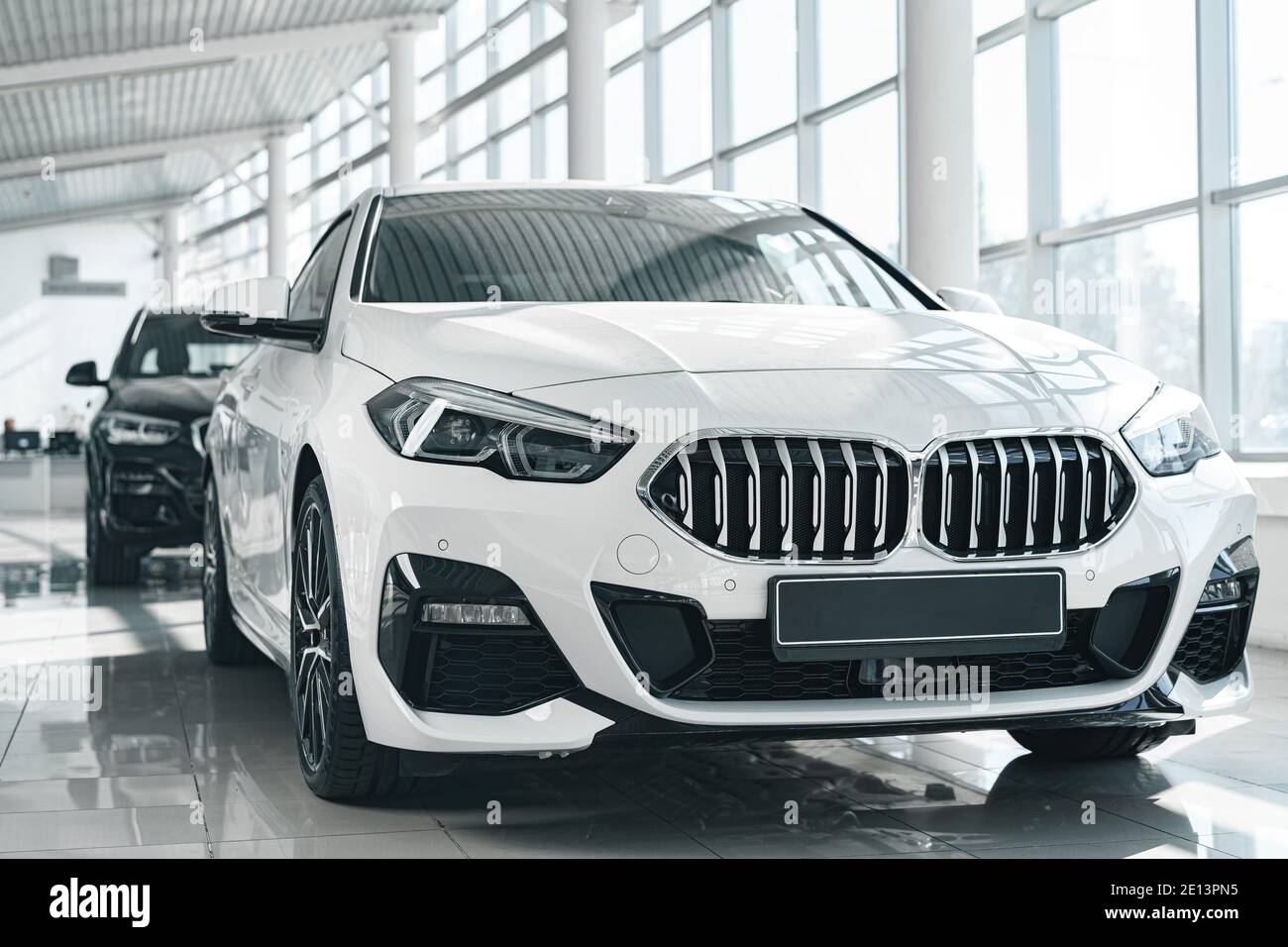 Radiator grille of a new luxury car Stock Photo - Alamy