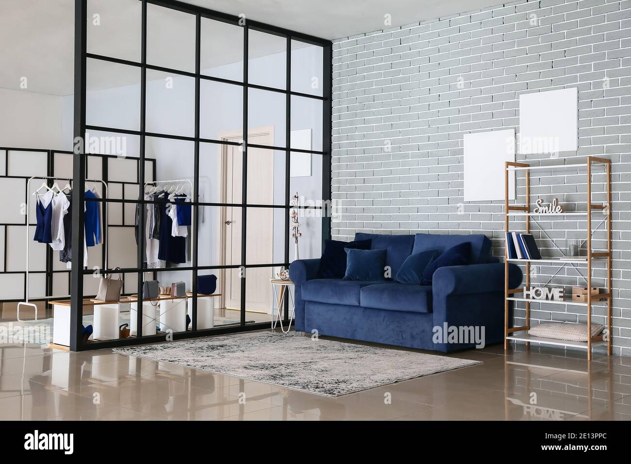 Interior of modern living room with wardrobe Stock Photo - Alamy