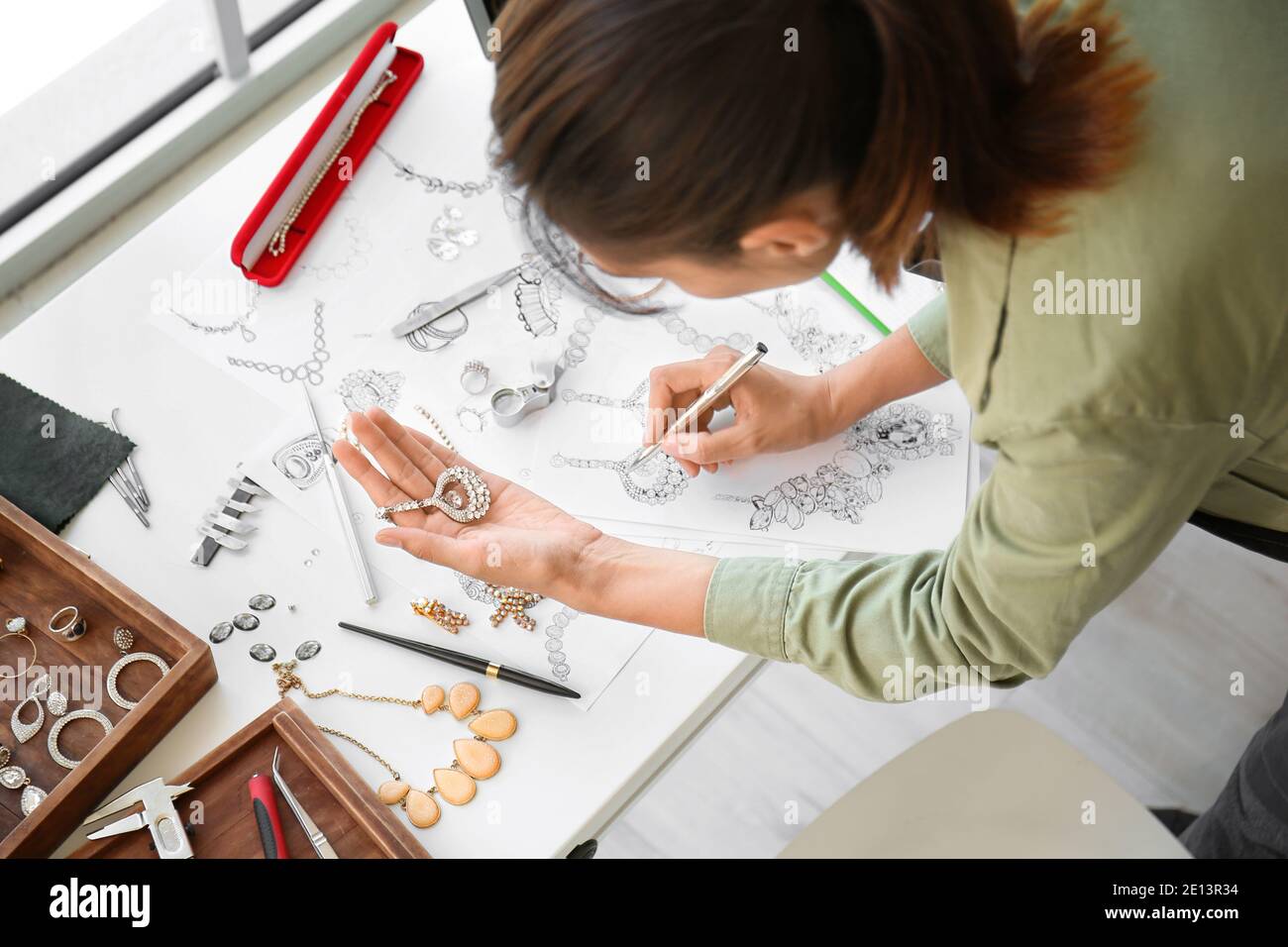 Hand female goldsmith her workshop hi-res stock photography and images ...